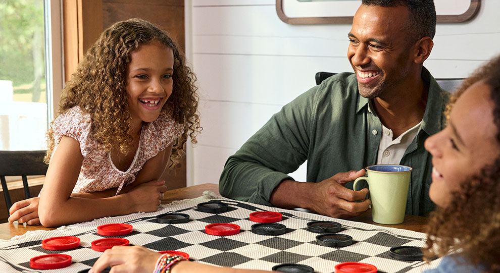Cracker Barrel family playing checkers